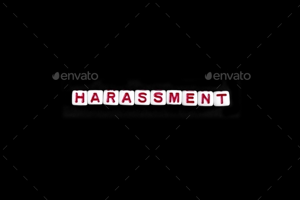 Word “Harassment” made out of beads on black background Stock Photo by ...