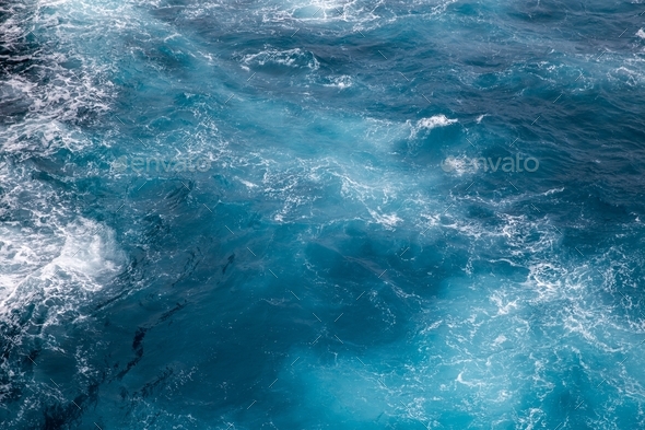 Beautiful ocean water surface with foam. Deep blue color Stock Photo by ...