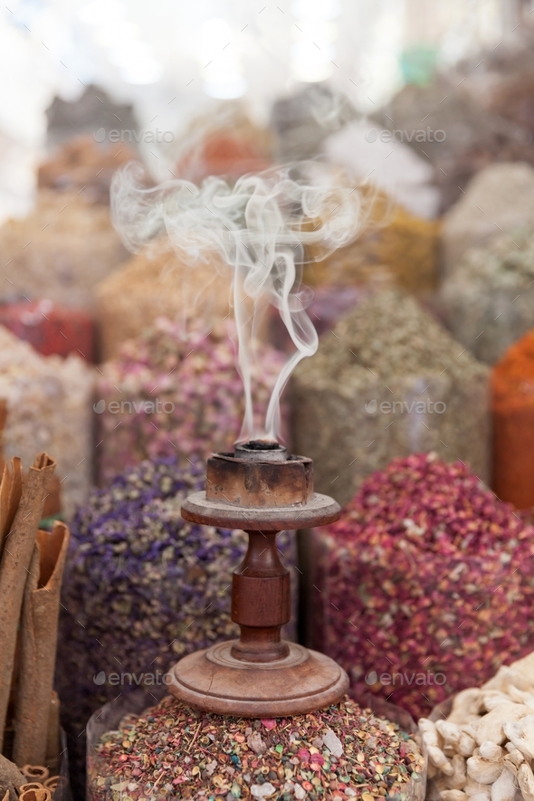 Arabic traditional incense bukhoor agar wood burner in with smoke, used ...