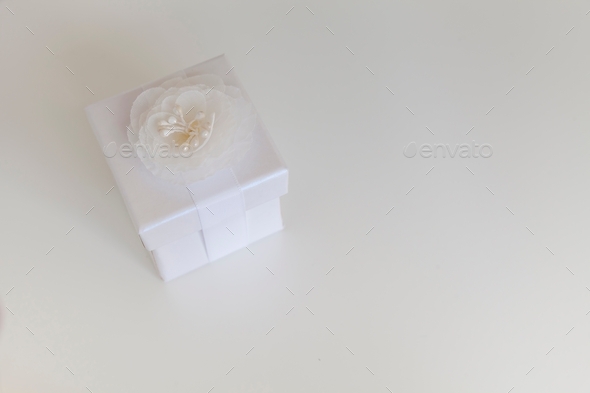 White gift box on off white background Stock Photo by vinnikava | PhotoDune