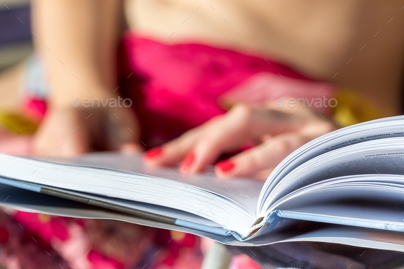 Time for reading a book, girl reading a book Stock Photo by vinnikava