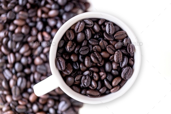 Cup of coffee filled with coffee beans isolated on white background ...