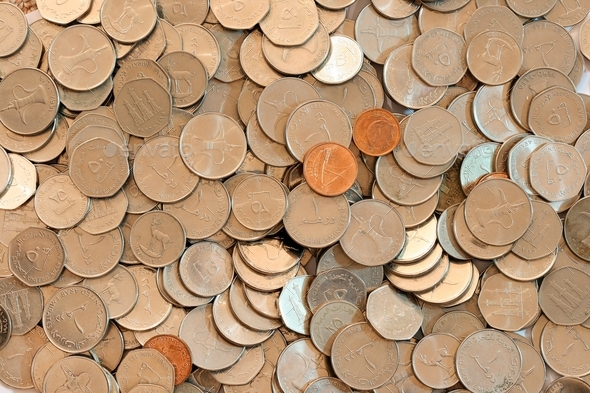 Many coins, top view Stock Photo by vinnikava | PhotoDune
