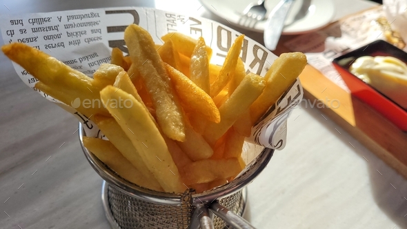 Delicious French fries portion, junk food, yummy but unhealthy snack ...