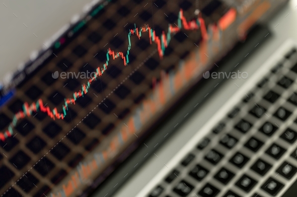 Trading chart displayed on the screen of the laptop. Stock market ...