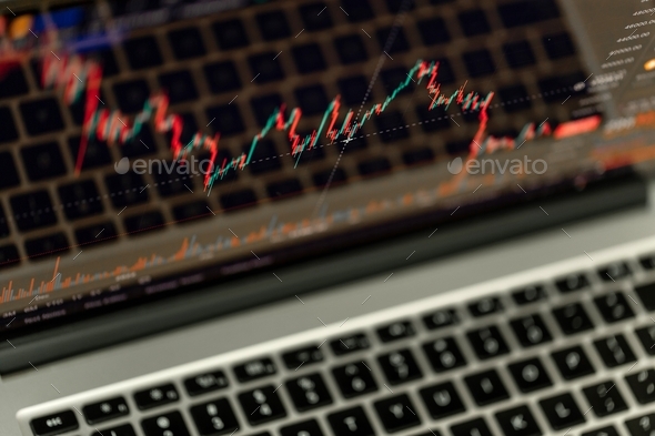 Trading chart displayed on the screen of the laptop. Stock market ...