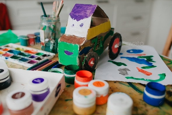 The craft made of cardboard by the hands of a child. Stock Photo by ...