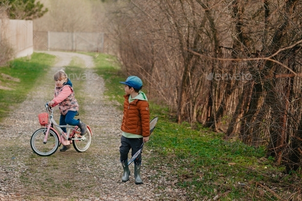Kids playing outside in spring Stock Photo by Katerina_zhiltsova ...