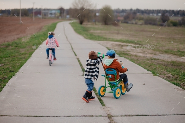 Kids playing outside in spring Stock Photo by Katerina_zhiltsova ...