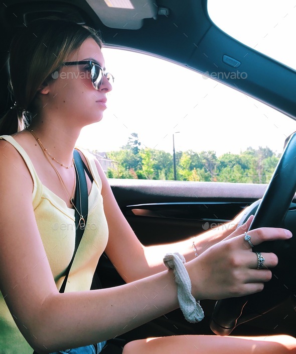 Young teenage girl taking her first driving lessons Stock Photo by ...