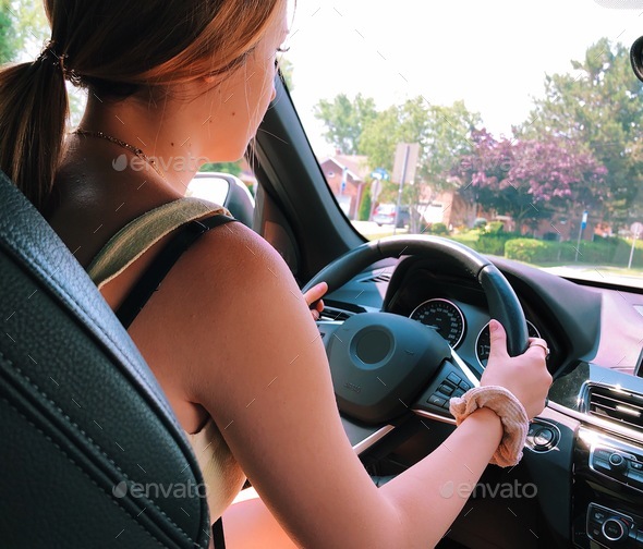 Young teenage girl taking her first driving lessons Stock Photo by ...
