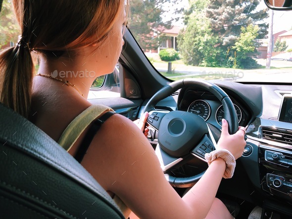 Young teenage girl taking her first driving lessons Stock Photo by ...