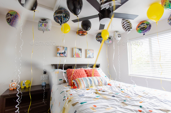 Graduation balloons in a bedroom Stock Photo by takemewu31 | PhotoDune