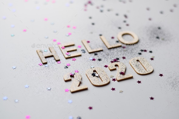 Happy New Year 2020 with glitter and pink and silver star sprinkles on ...