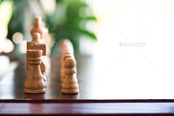 Game of chess board set up, pieces lined up in a row with copy space ...