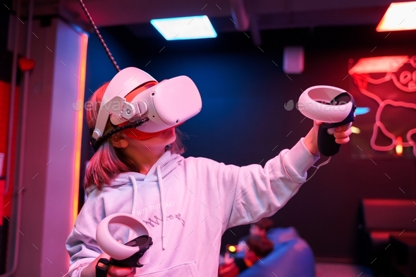 Girl playing vr game in 3d glasses headset.Virtual reality simulation ...