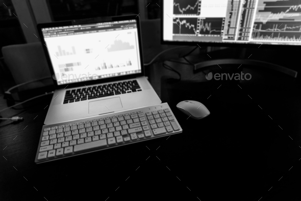 Black and white data on computer home work station desk Stock Photo by ...