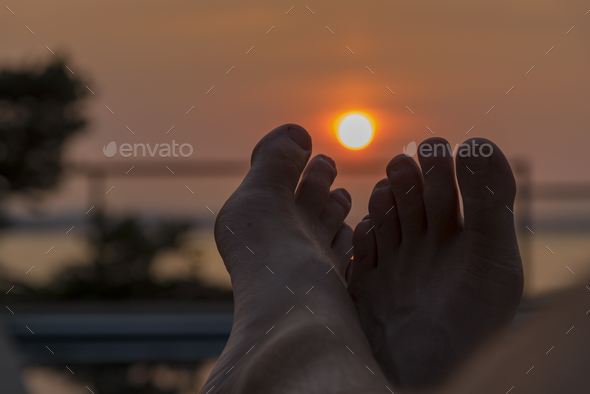 Barefoot sunset by the pool sun going down between toes, golden hour ...