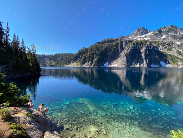 Gen Z young people swimming in alpine lake Stock Photo by RLTheis ...