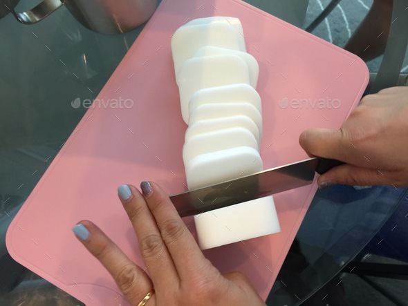 Cutting homemade soap bar Stock Photo by weewendy | PhotoDune