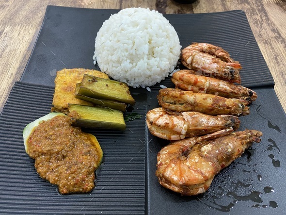 Nasi udang penyet. Stock Photo by weewendy | PhotoDune