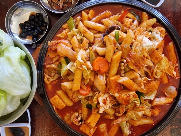 Tteokbokki or topokki seafood. Korean hot and spicy rice cake cooked ...