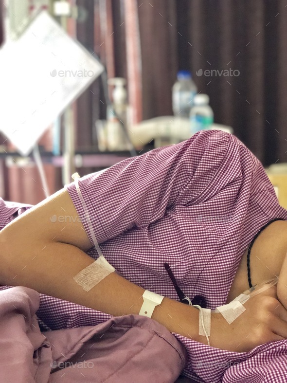 People sick laying on hospital bed blur indoor background Stock Photo ...