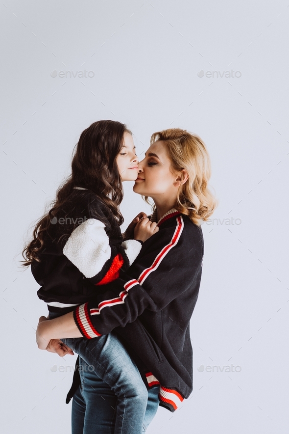 Mom and daughter hugs, warm maternal feelings, family values, family ...