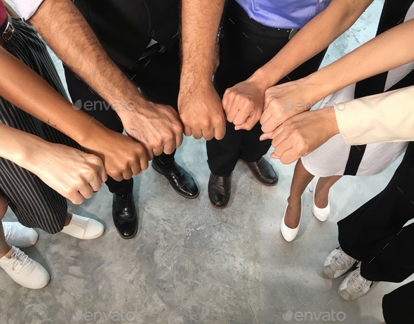 People hands fists joints together as team Stock Photo by FoToArtist_1