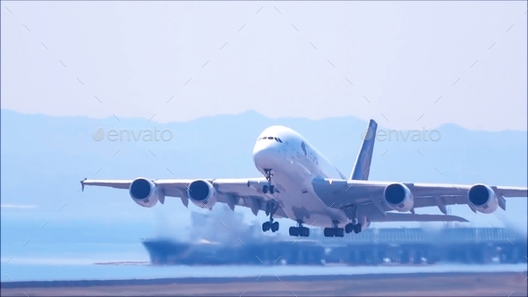 Airline plane flights take off at the airport Stock Photo by FoToArtist_1