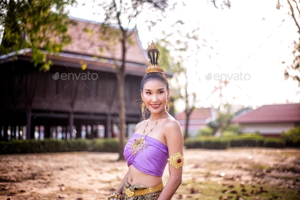 Asia woman wearing traditional Thai dress, The costume of the national dress of ancient Thailand ...