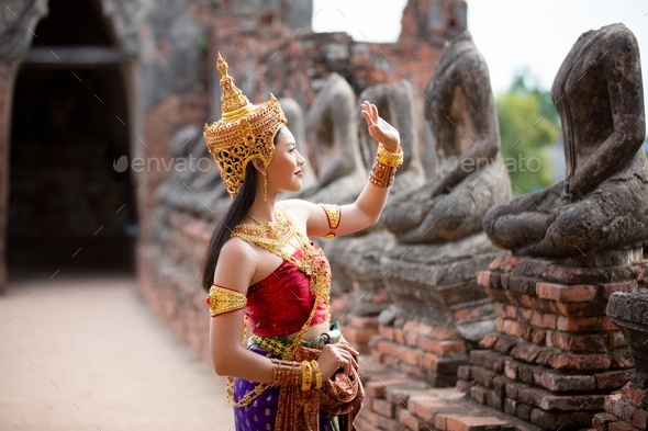 Asia woman wearing traditional Thai dress, The costume of the national dress of ancient Thailand ...