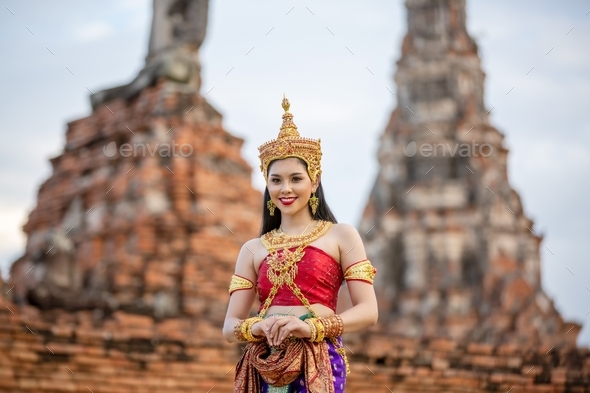 Asia woman wearing traditional Thai dress, The costume of the national dress of ancient Thailand ...