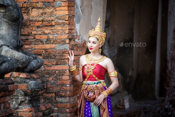 Asia woman wearing traditional Thai dress, The costume of the national dress of ancient Thailand ...
