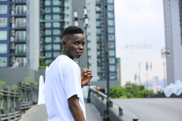 Portrait of a young black skin man with Afro hair on the street Stock ...