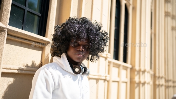 Young smiling attractive black man lifestyle portrait. Stock Photo by ...