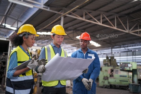 Machine Maintenance procedure concepts. A team of African American ...