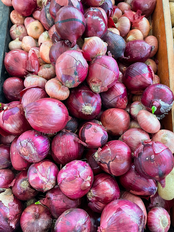 Stack of red onion on display at market. Stock Photo by Jsttanrak ...