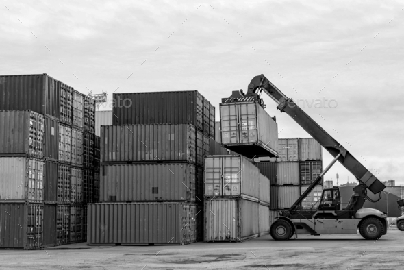 Mobile stacker handler in action at a container terminal. Stock Photo ...