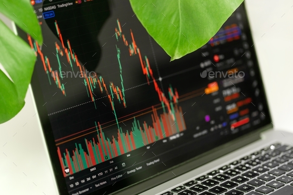 Trading chart displayed on the screen of the laptop. Stock market ...