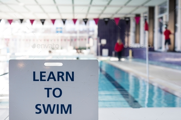 Learning to swim sign Stock Photo by Lightitup_now | PhotoDune