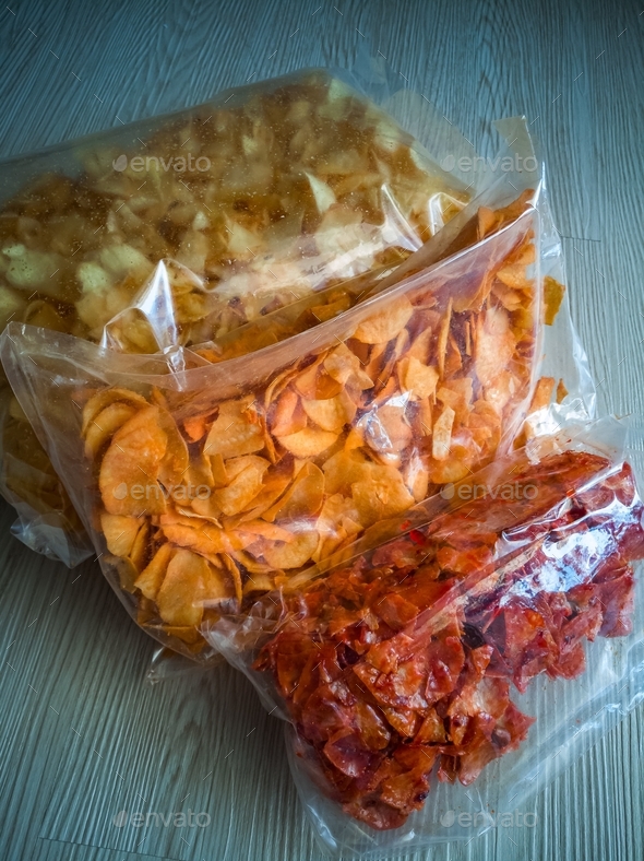 various selections and flavours traditional snacks in plastic packets ...