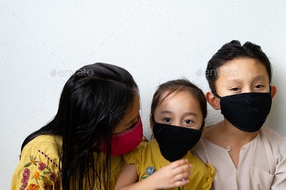 children wearing face masks Stock Photo by ellinnur | PhotoDune