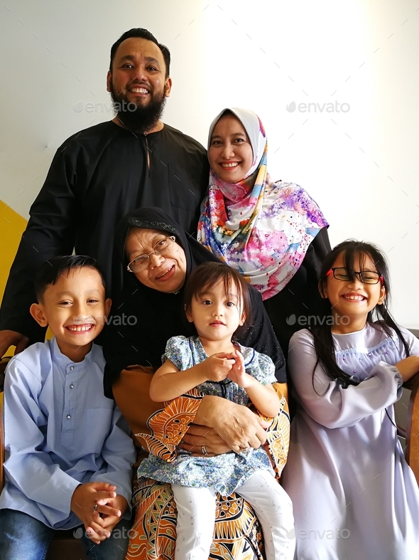 happy malay muslim family portrait during Hari Raya Aidilfitri Eid ...