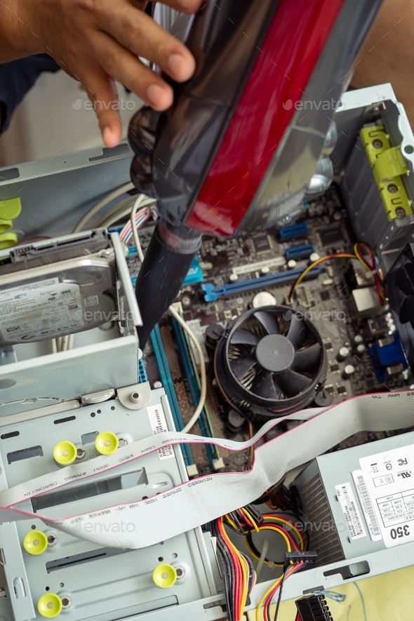 vacuum maintenance cpu unit computer. cleaning Stock Photo by ellinnur