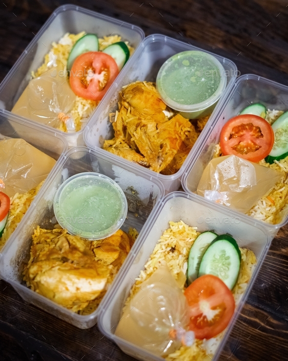 chicken mandi rice middle east food in takeaway container Stock Photo ...