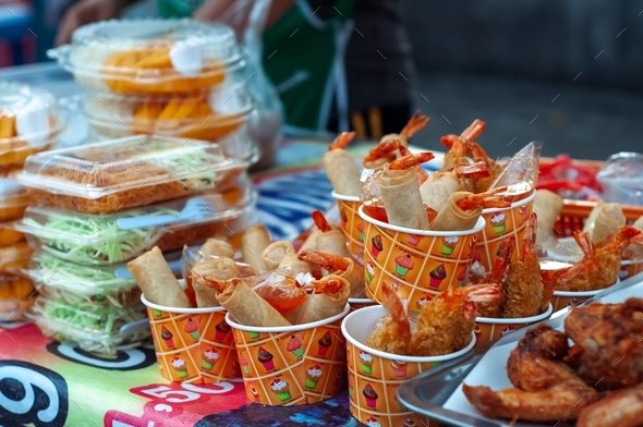 thailand spring rolls in containers for sale at a stall Stock Photo by ...