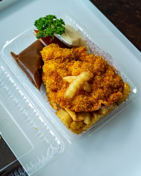 Fried chicken chop, chicken coated in breadcrumbs and fried. Served ...