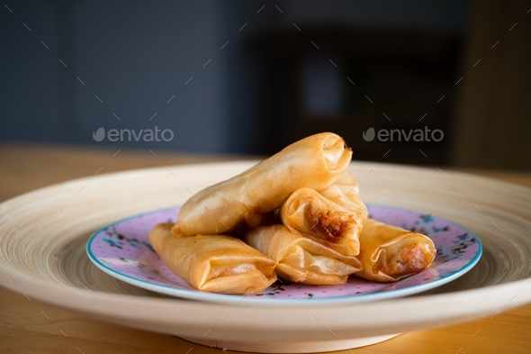 popia, lumpia or spring roll served in a plate Stock Photo by ellinnur