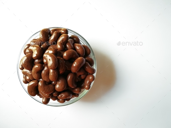 Collection set of Chocolate candy in bean shape in a bowl on a brown ...